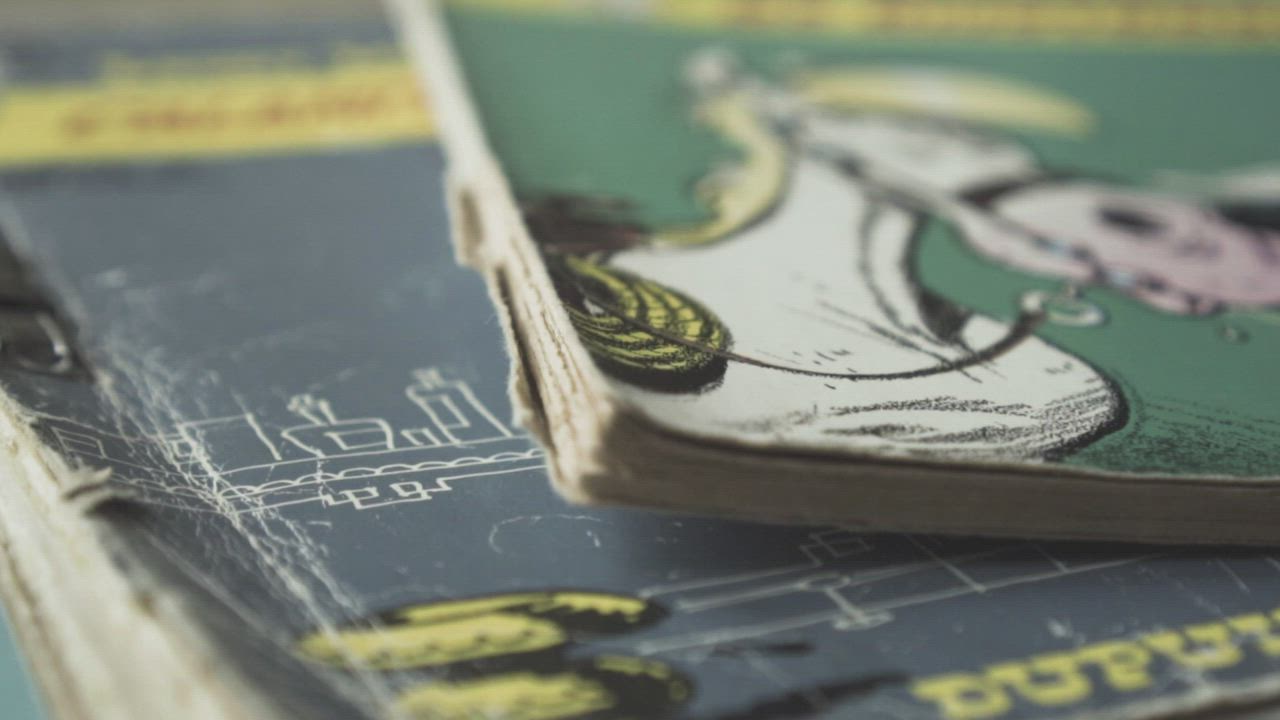 Stack of old comics - Free Stock Video