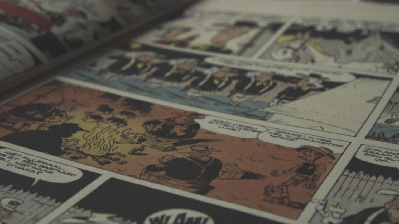 Vintage comic book open in a table - Free Stock Video