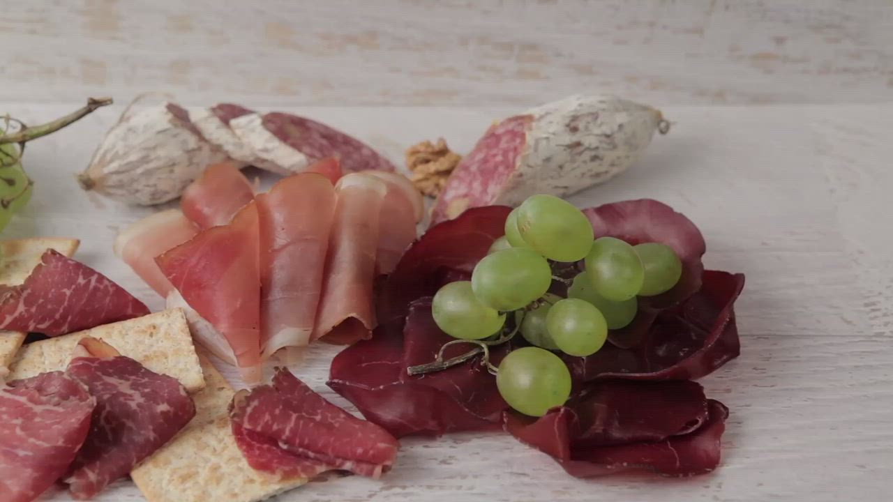 Meat selection on a table - Free Stock Video