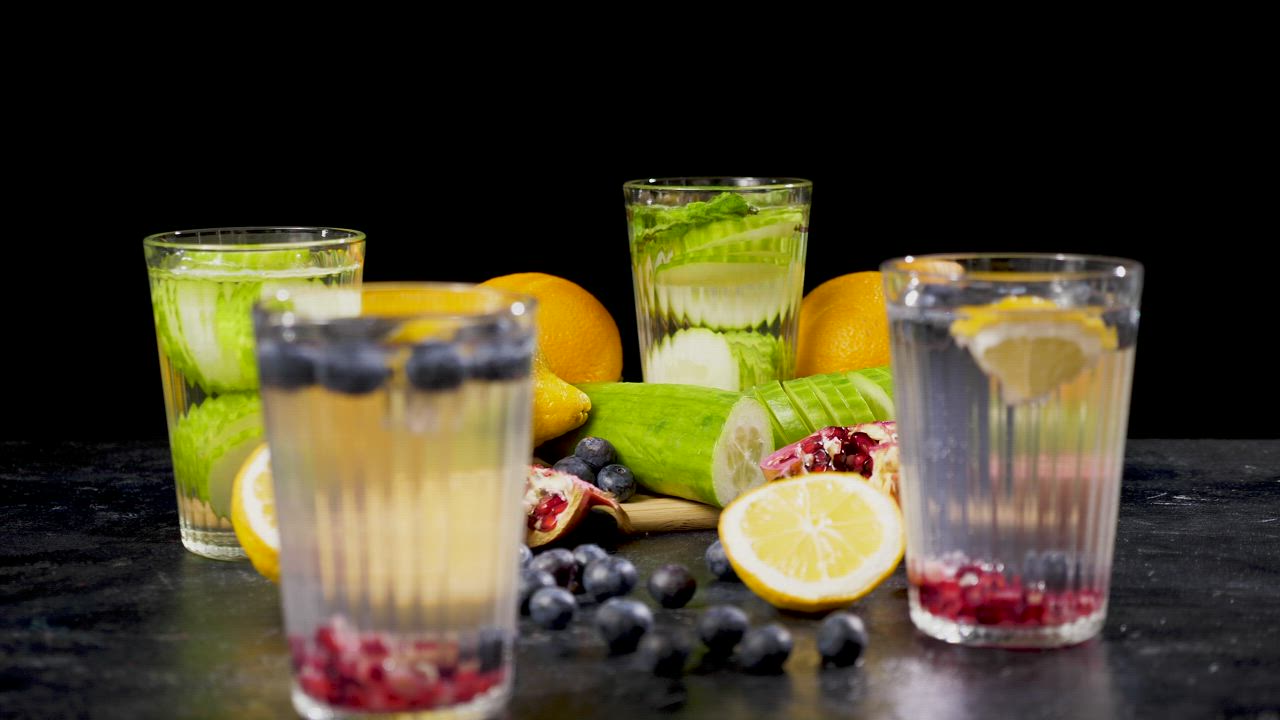 Mixed fruit drinks on a table - Free Stock Video