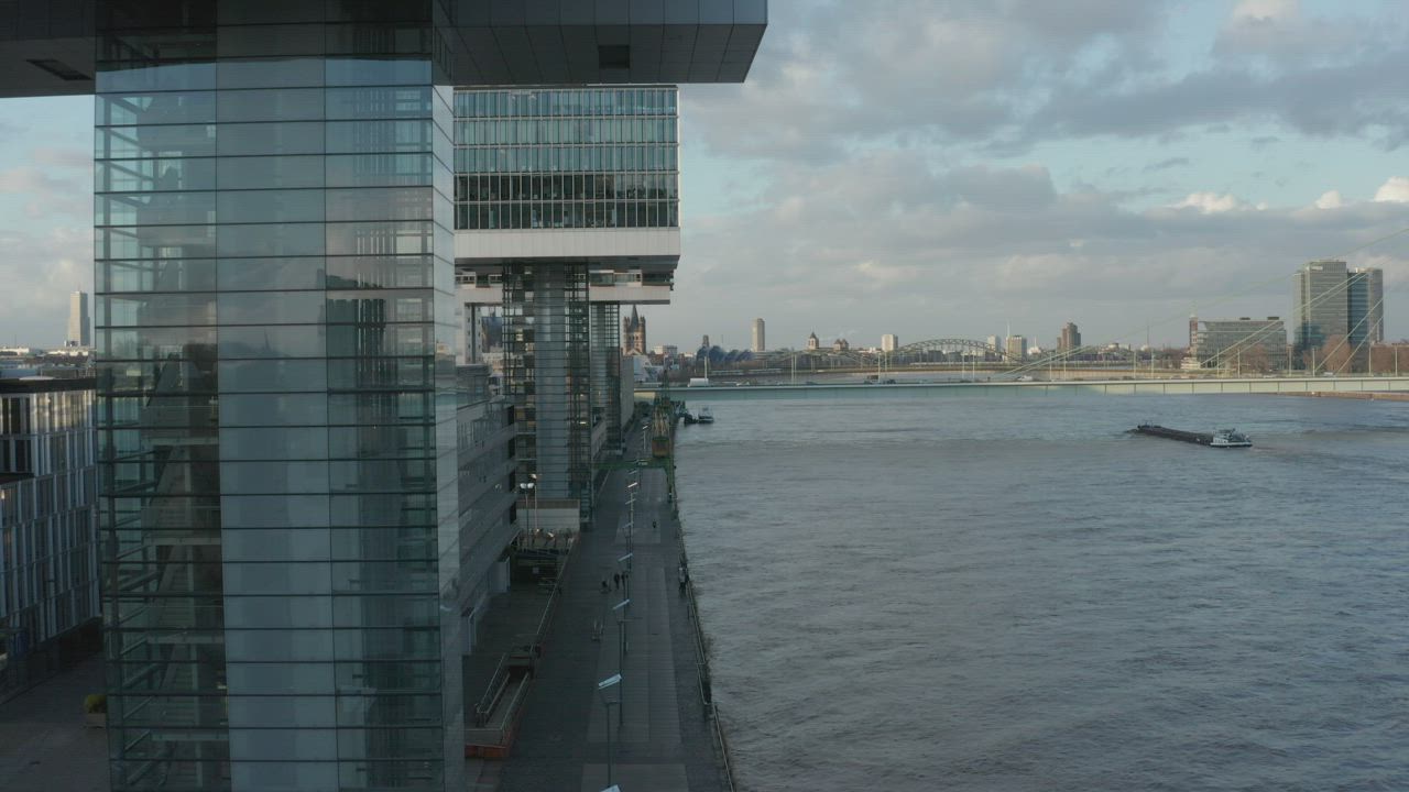 Corporate office buildings next to a river - Free Stock Video