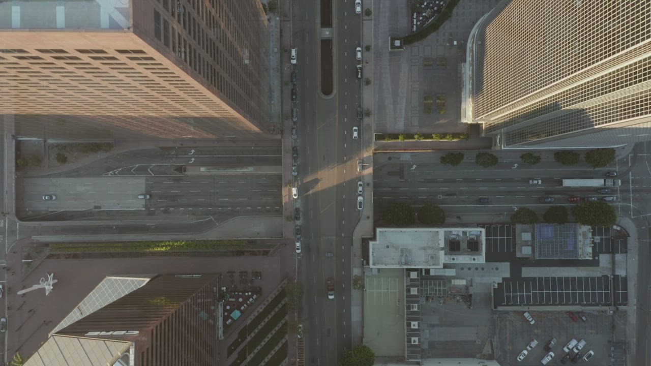Downward view above skyscrapers in a city - Free Stock Video