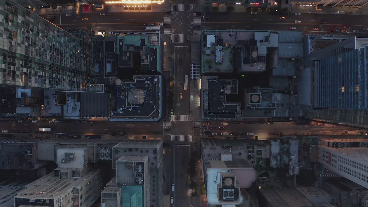 City streets above the buildings at night - Free Stock Video