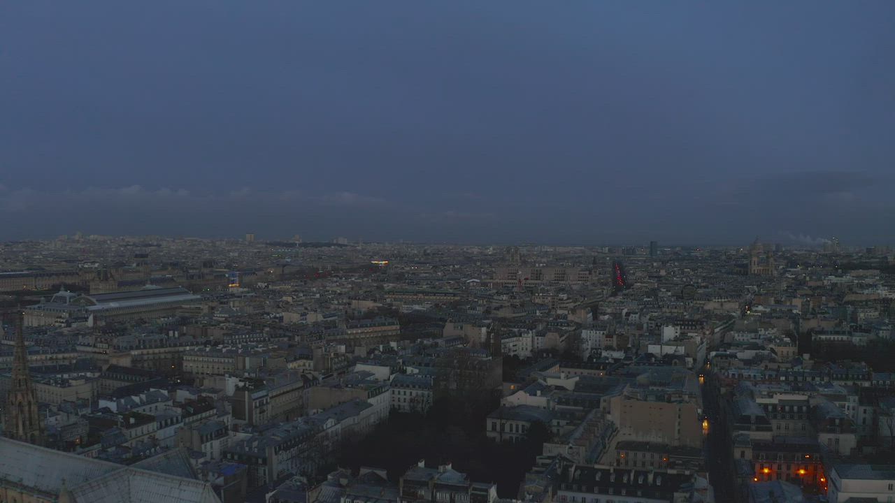 Flying over the city of Paris at night - Free Stock Video