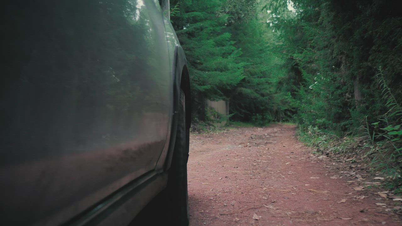 Side approach of a gray car moving along the rural road - Free Stock Video