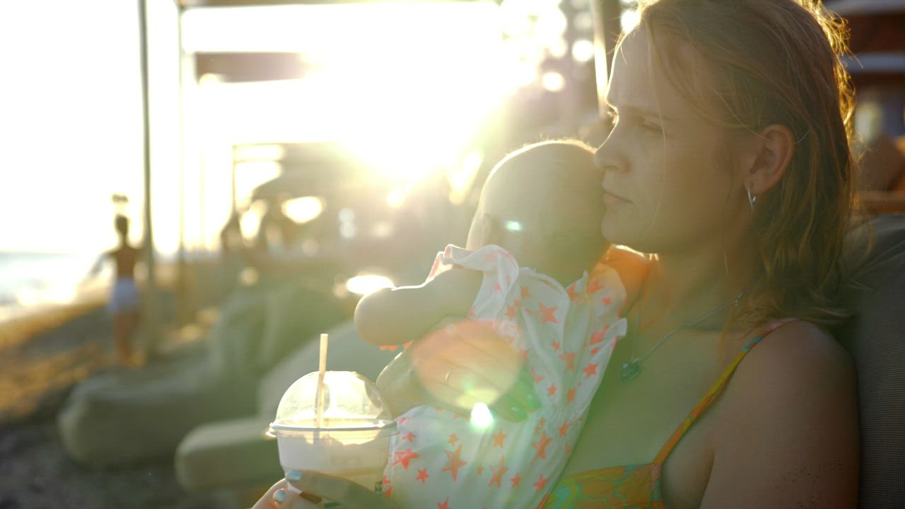 Mother enjoying a break with her baby - Free Stock Video