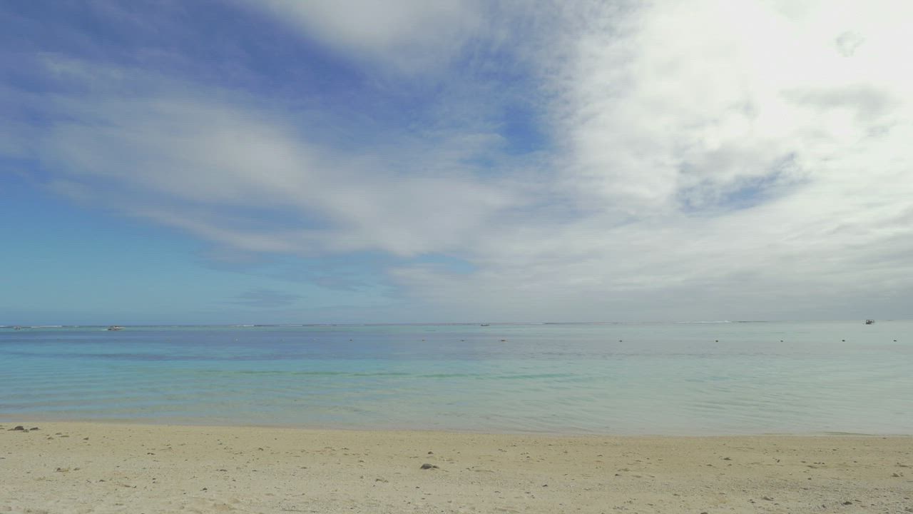 Shallow water along a tropical beach - Free Stock Video
