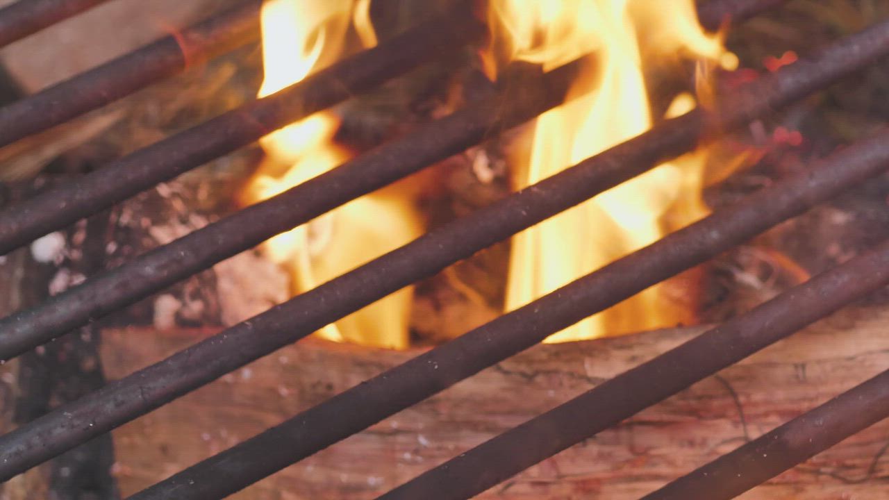 Flames burning inside a grill - Free Stock Video