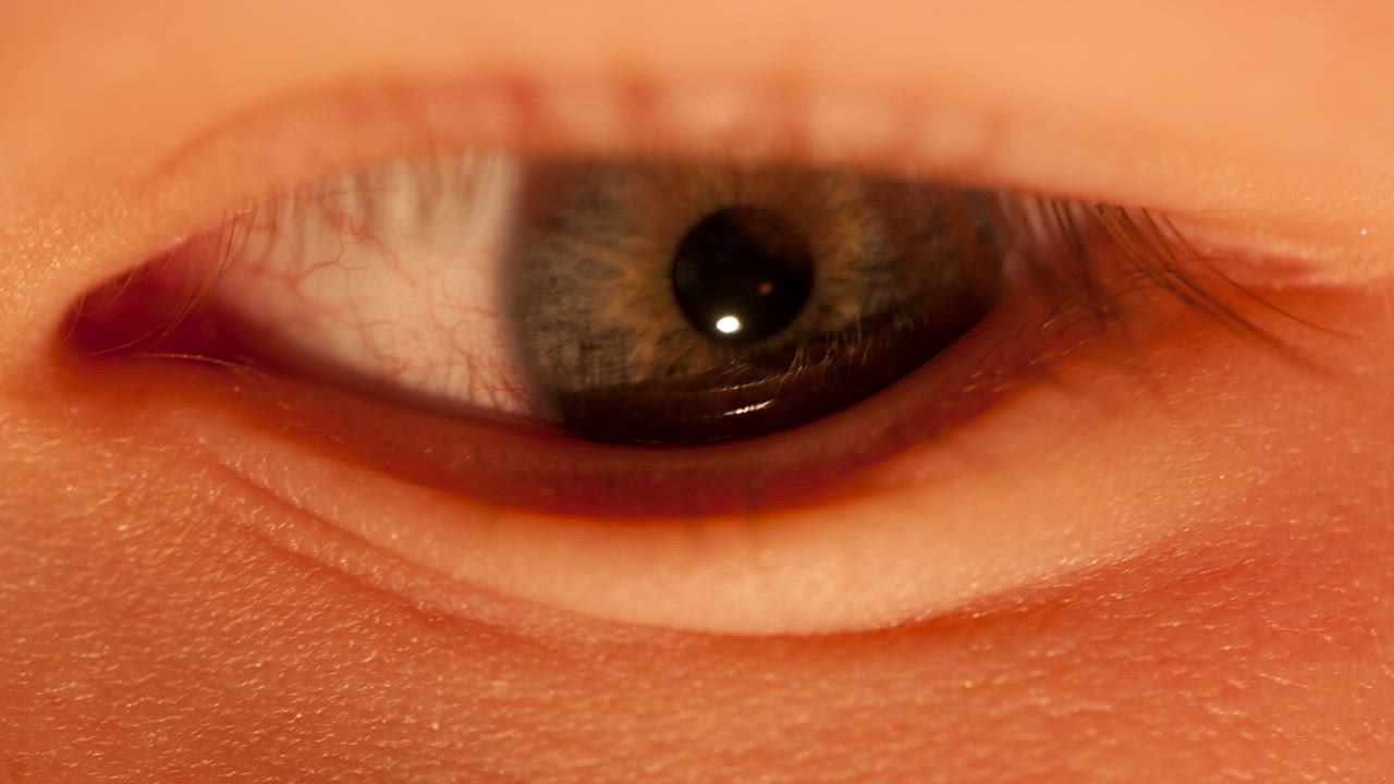 Childs eye looking around - Free Stock Video
