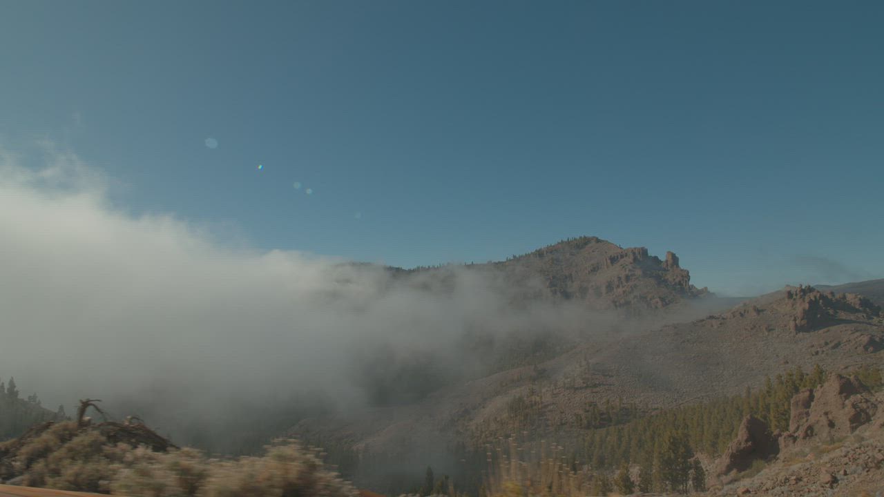 Mist falling over a mountain - Free Stock Video