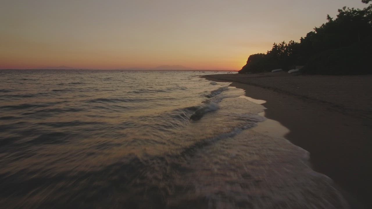 Sunset appearing behind the corner - Free Stock Video