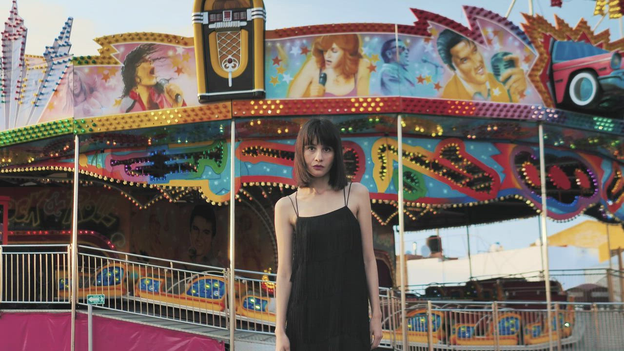 Portrait of a woman at the fair - Free Stock Video
