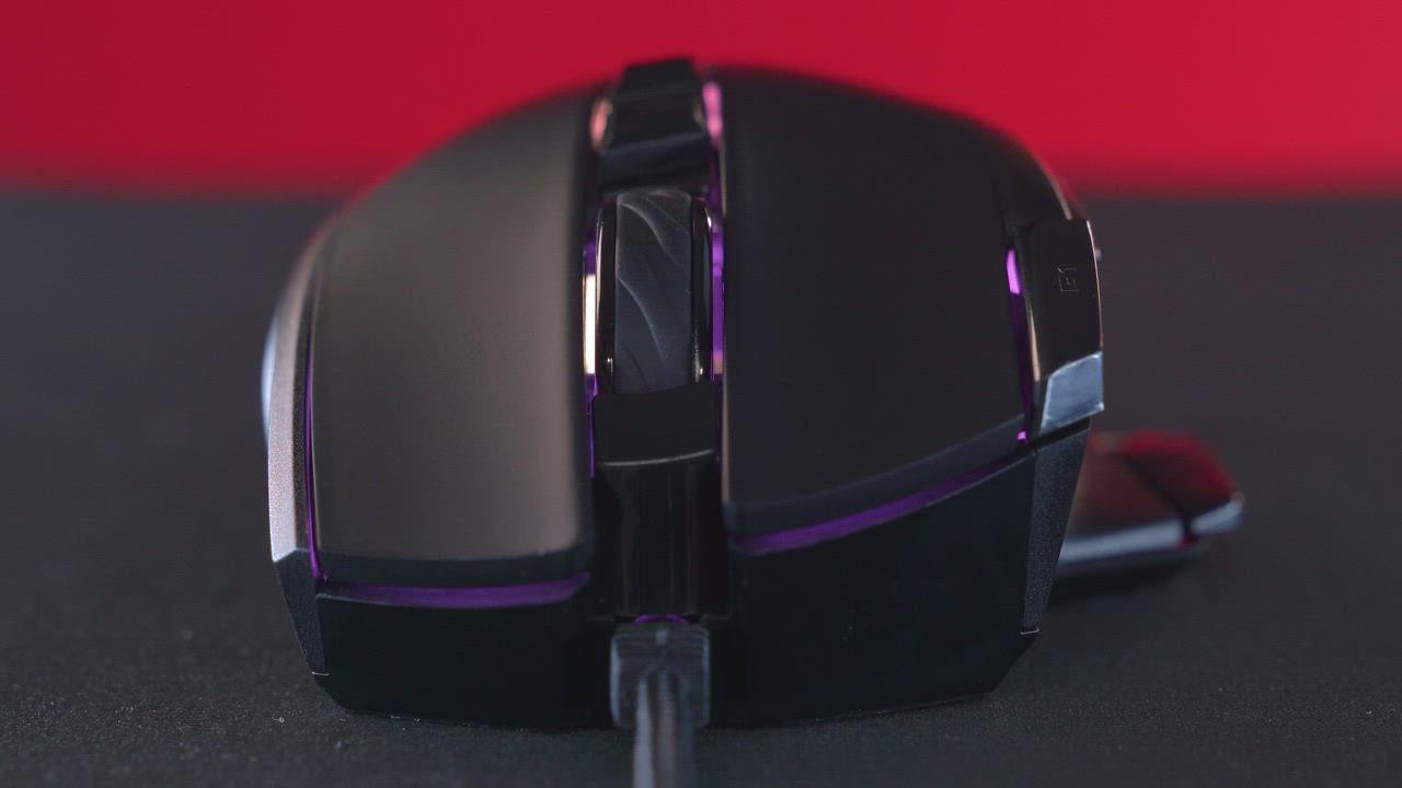 Close up of a gaming mouse with RGB lighting - Free Stock Video