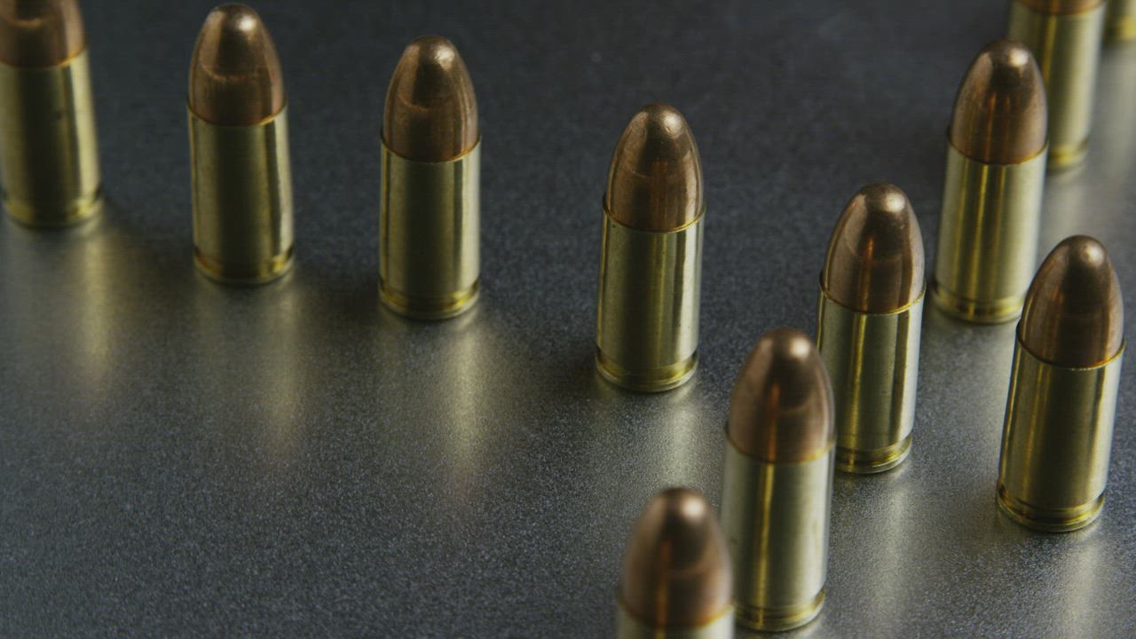 Close up of rotating bullets - Free Stock Video