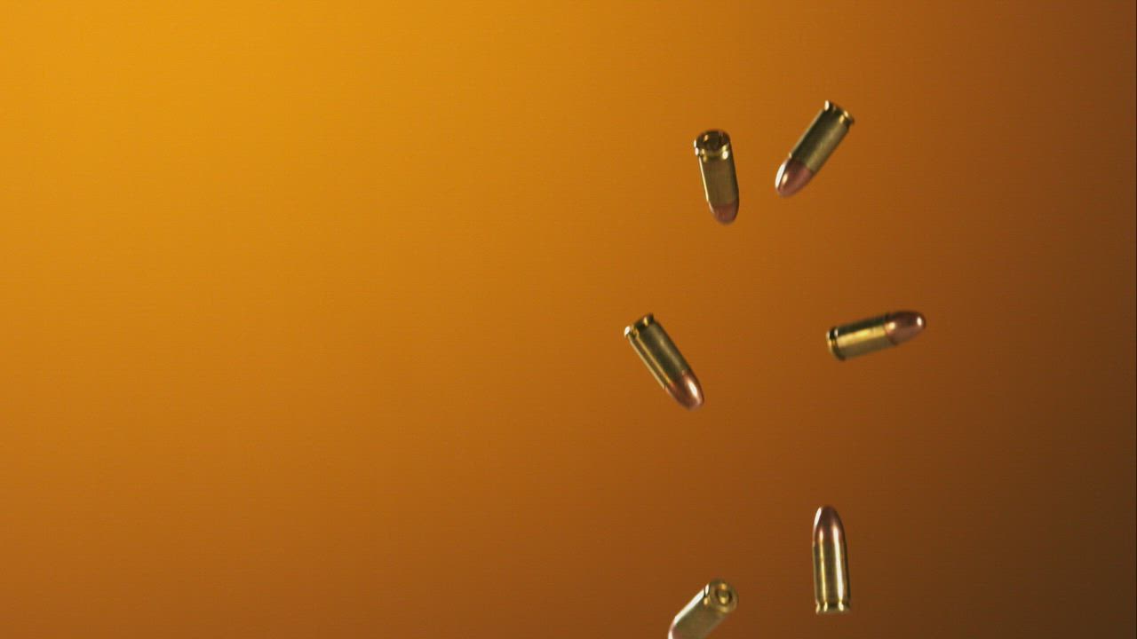 Falling bullets bouncing - Free Stock Video