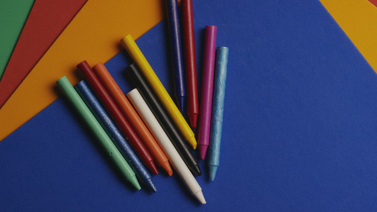 Colorful composition of paper and crayons - Free Stock Video