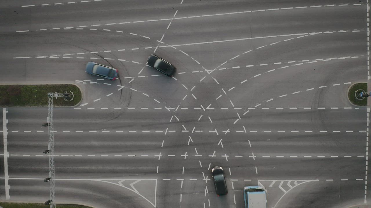Aerial view of traffic in the cross road - Free Stock Video