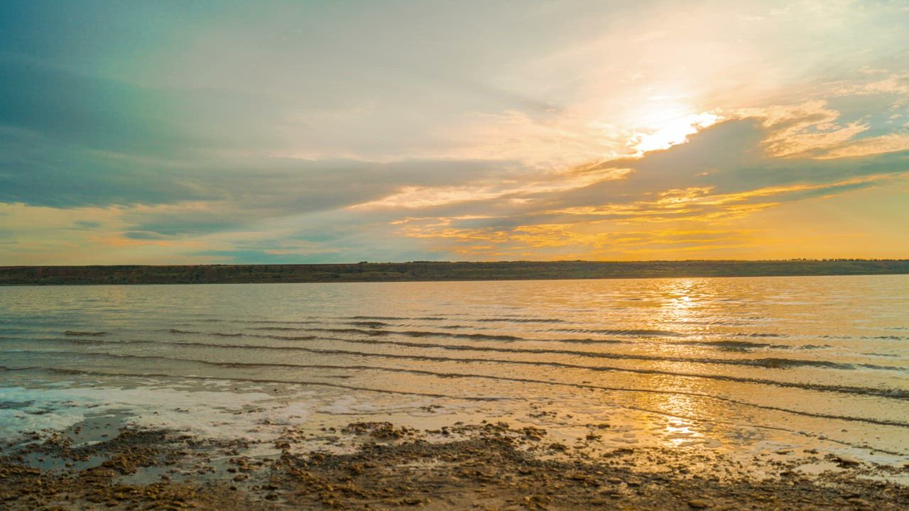 Sunset over the lake time lapse - Free Stock Video