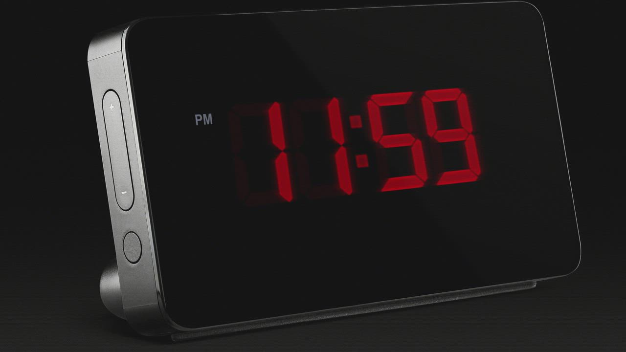 Digital clock in the dark marking midnight - Free Stock Video