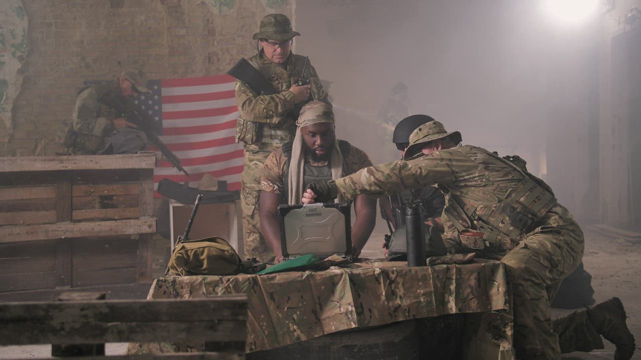 Squad working from a bunker - Free Stock Video