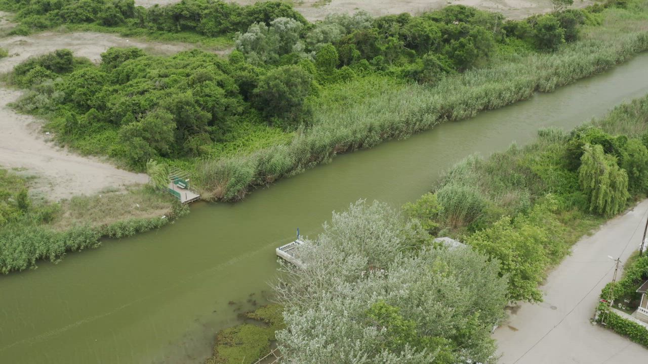 Crossing a small river using a raft - Free Stock Video