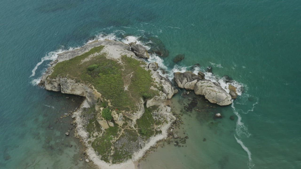Island at the edge of the beach - Free Stock Video