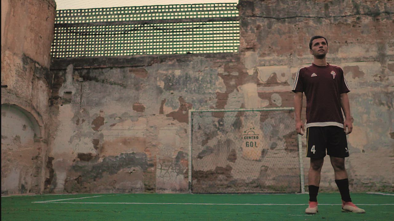 Soccer football player does an overhead kick goal - Free Stock Video