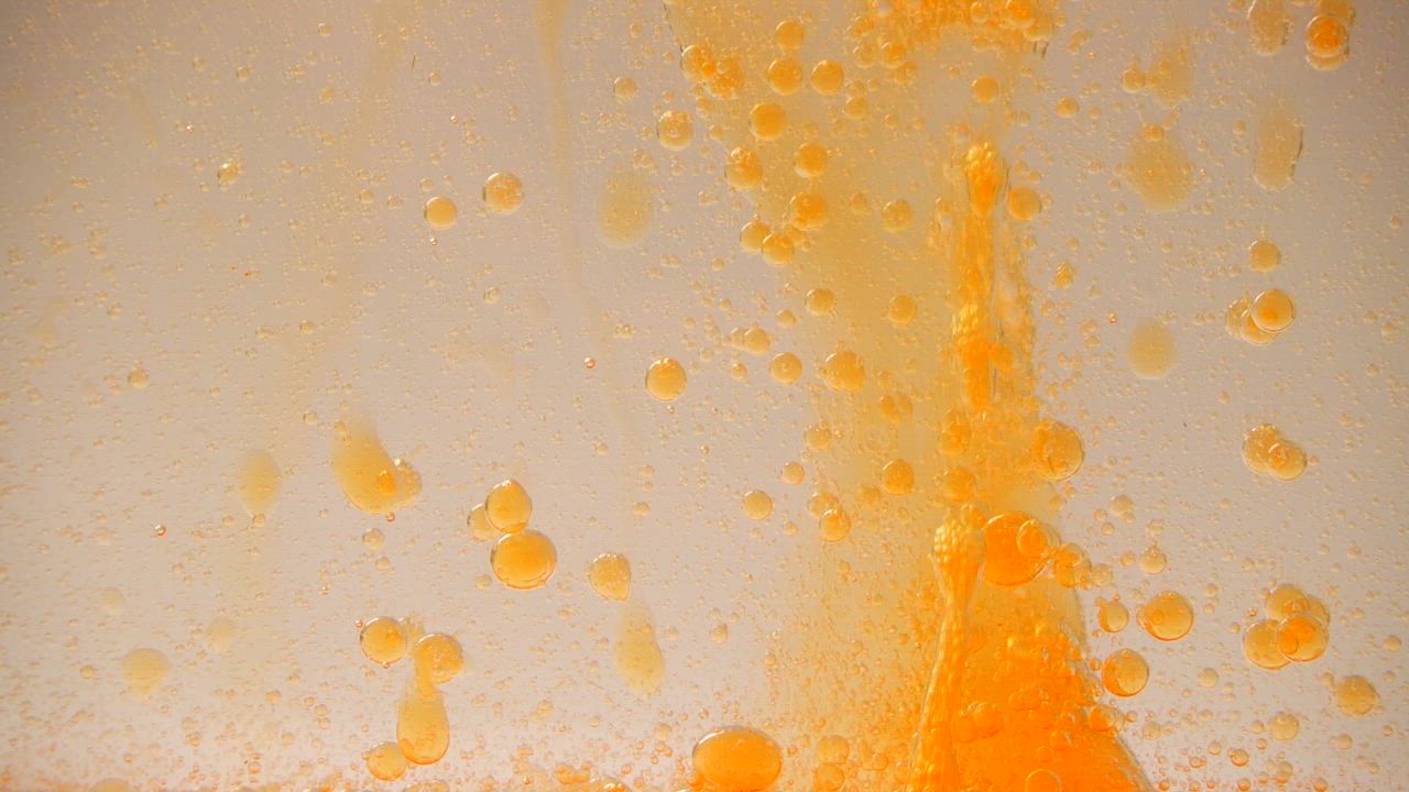 Yellow paint in a water tank - Free Stock Video