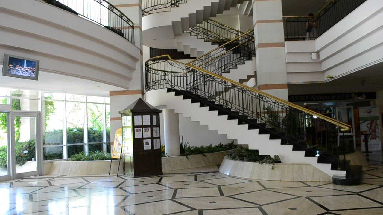 Stairs heading up through a large hotel - Free Stock Video