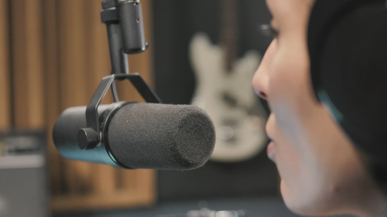 Person talking to the microphone - Free Stock Video