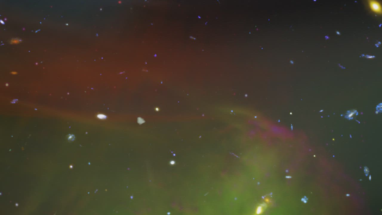 Stars and galaxies in space through apparent auroras - Free Stock Video