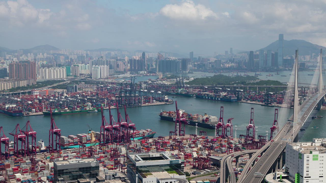Container port and Hong Kong cityscape - Free Stock Video