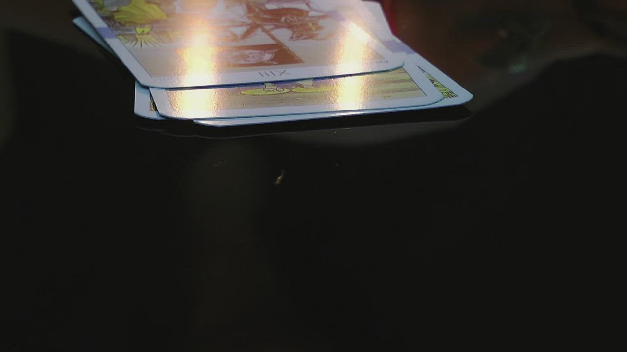 Person predicting the future with tarot cards - Free Stock Video