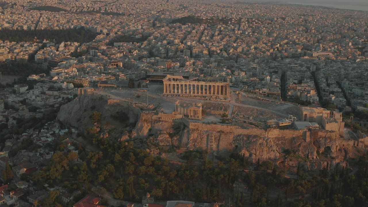 Aerial view of Acropolis in Athens during sunrise - Free Stock Video
