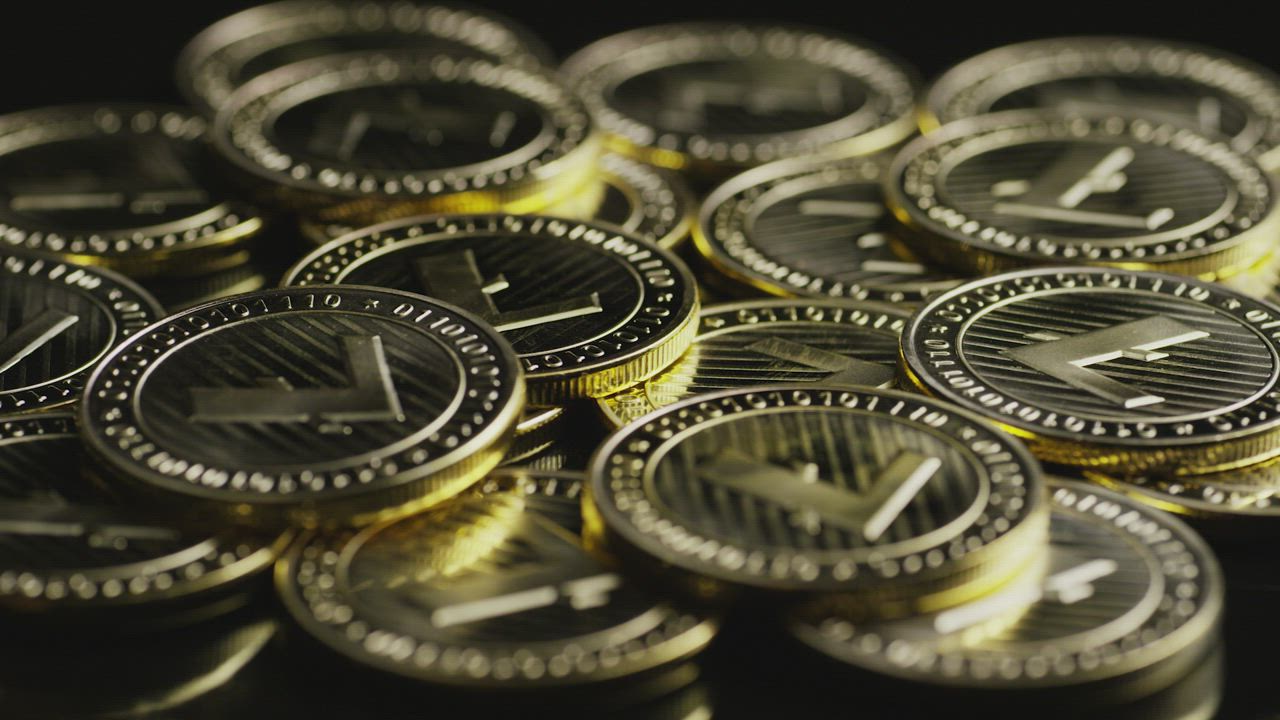 A stack of lite coins rotating - Free Stock Video