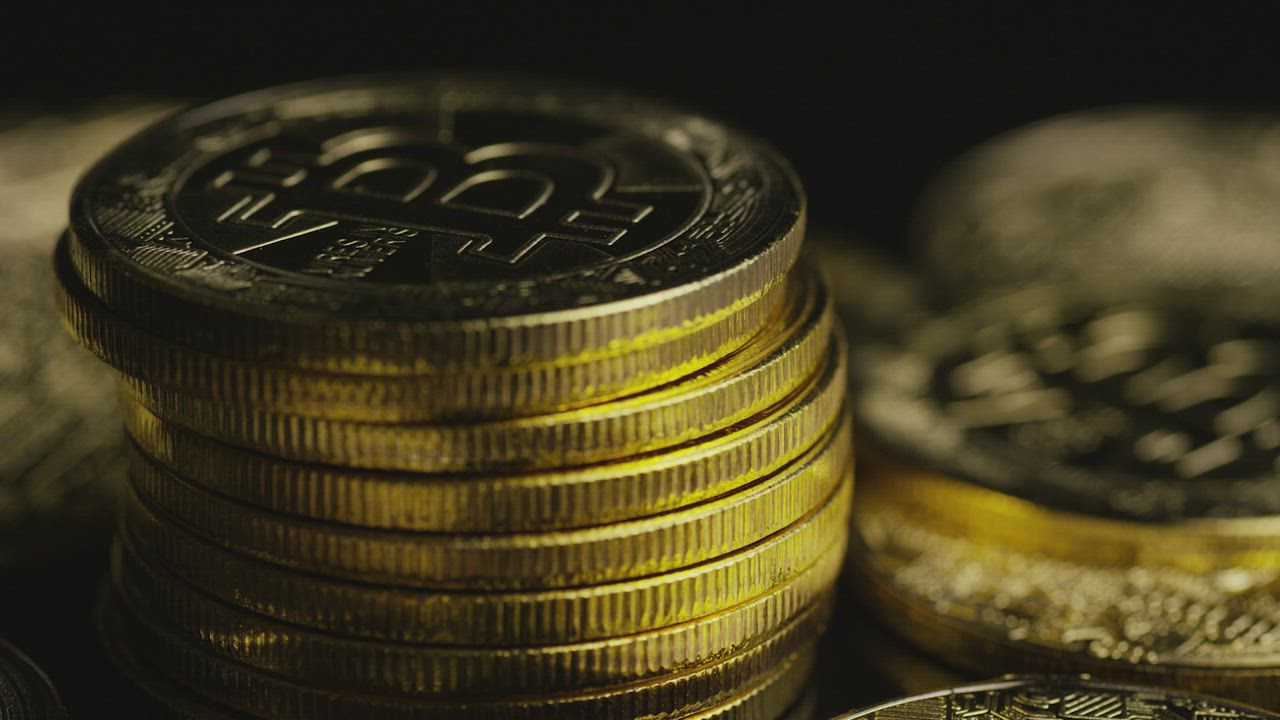 Stack of real bitcoins - Free Stock Video