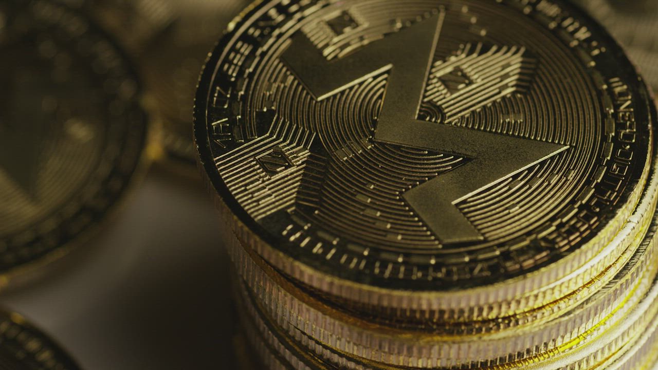 Stack of Monero coins rotating - Free Stock Video