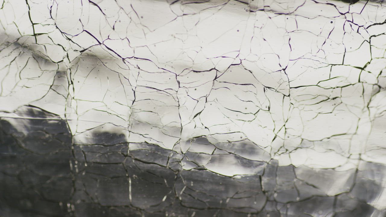 Cracked texture with abstract light - Free Stock Video