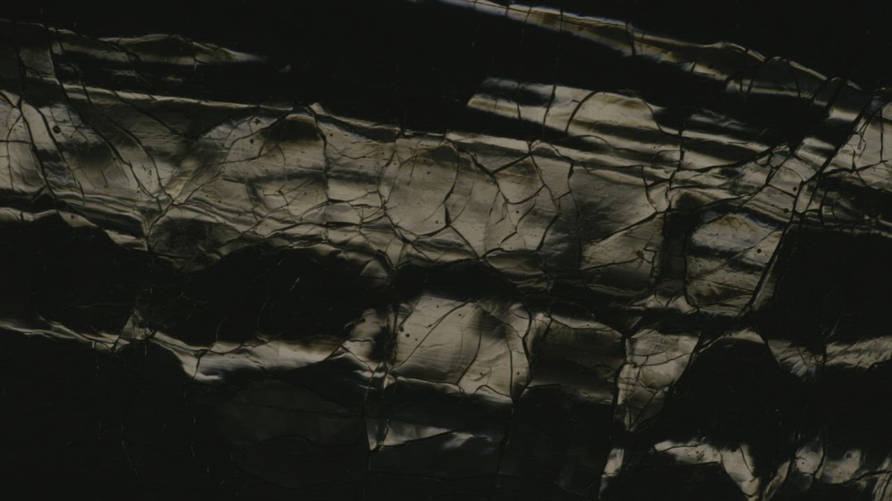 Cracked texture with diffused light - Free Stock Video