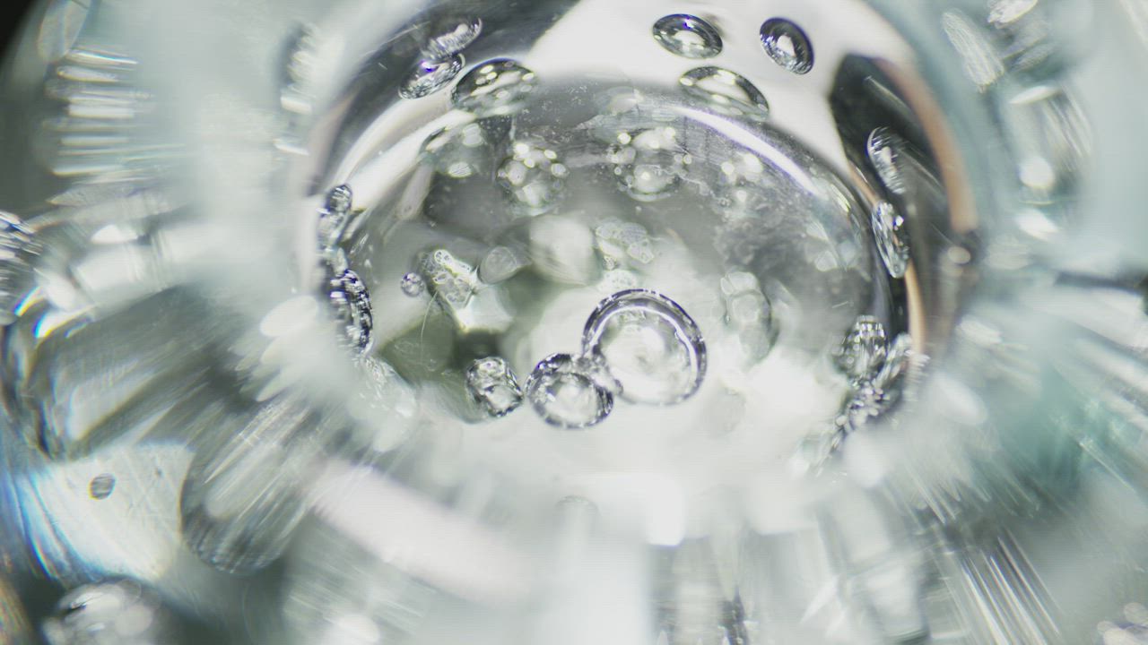 Glass texture with bubbles in motion - Free Stock Video