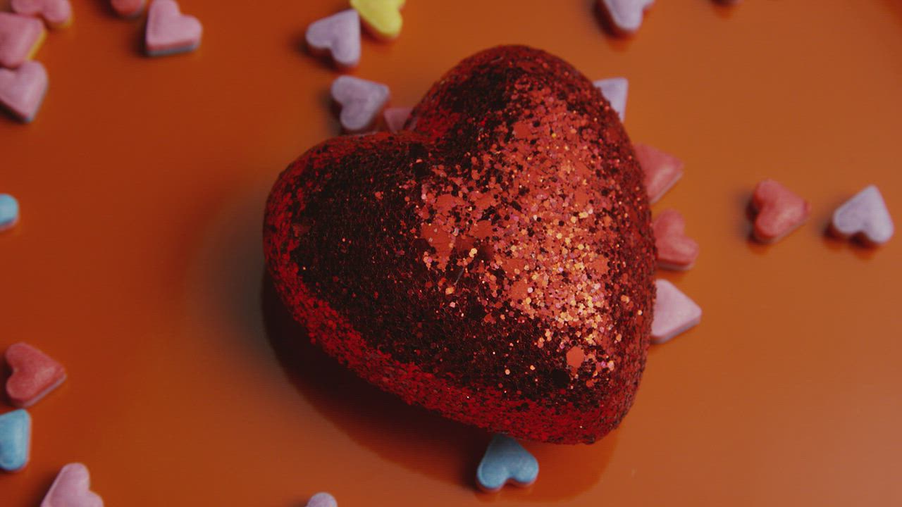 Shiny heart shape rotating - Free Stock Video