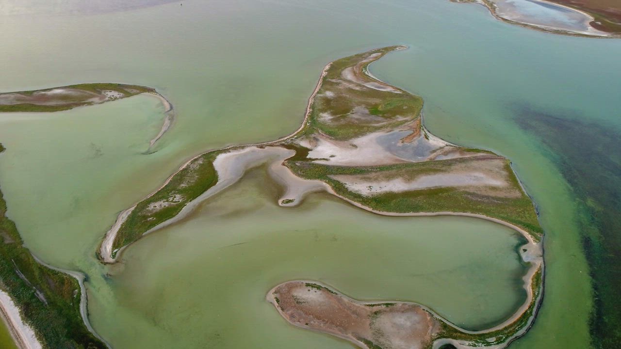 Abstracts islands in a beautiful lake, aerial - Free Stock Video
