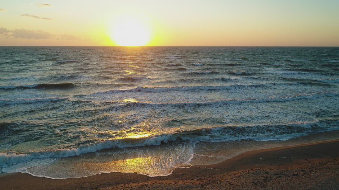 Big sun on the beach and sea skyline - Free Stock Video