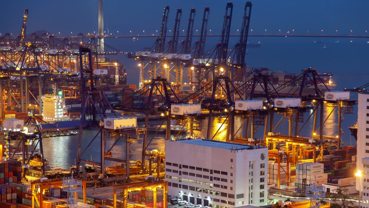 From day to night in the Hong Kong container port - Free Stock Video