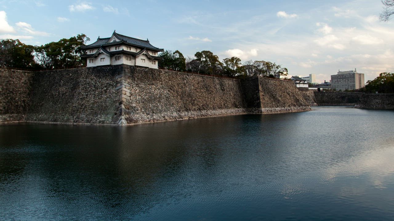River surrounding a Japanese medieval castle - Free Stock Video
