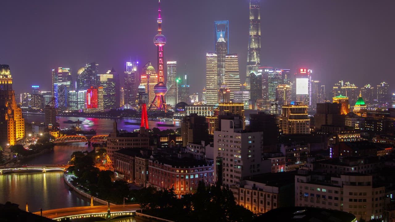 Illuminated buildings in Shanghai city scape - Free Stock Video