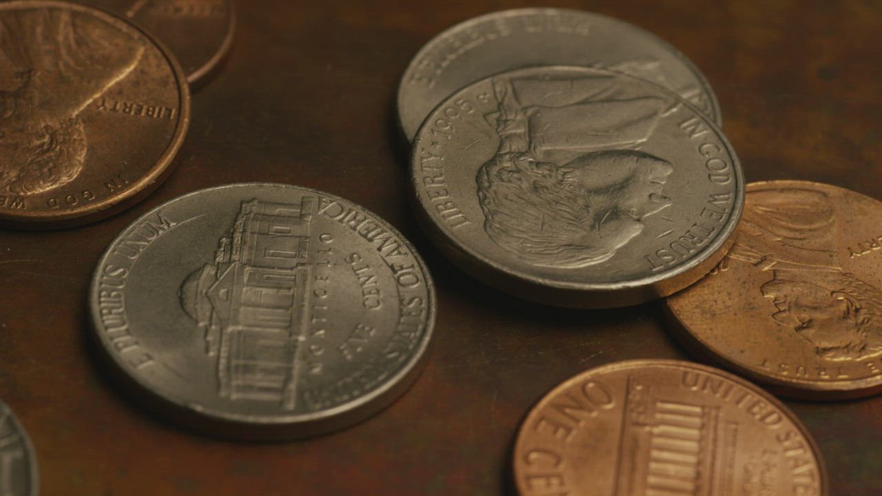 Copper and silver coins on the table - Free Stock Video