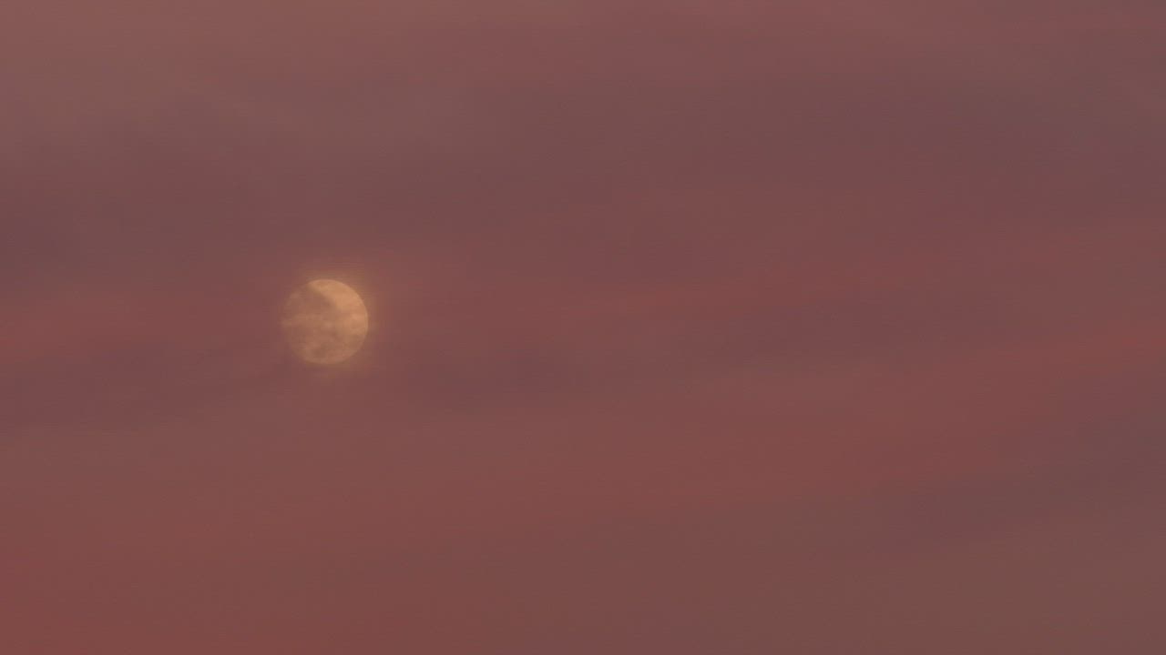 Clouds passing over the moon - Free Stock Video