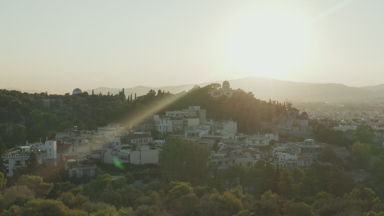 Sunlight dazzling aerial shot of Athens - Free Stock Video