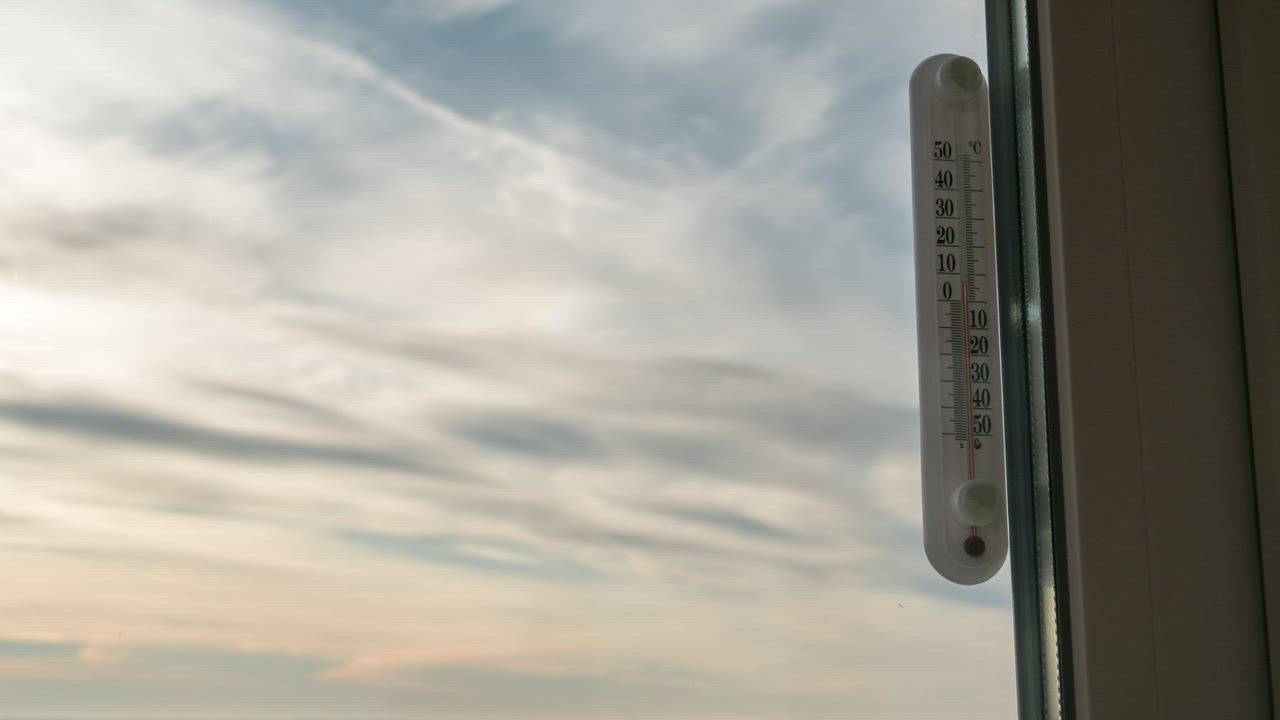 Thermometer in the window time lapse - Free Stock Video